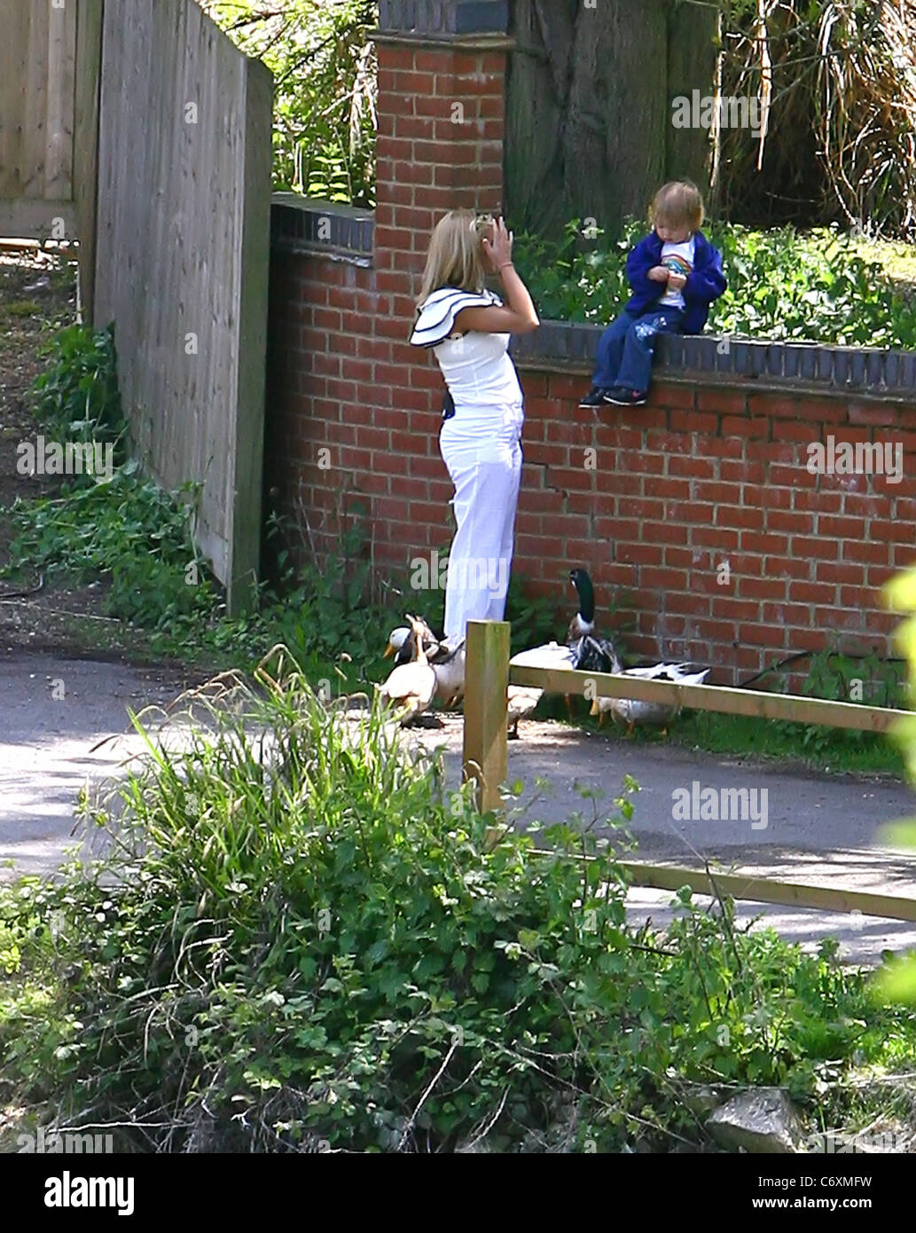 Kerry Katona and son Max Croft feeding the ducks by her house Sussex ...
