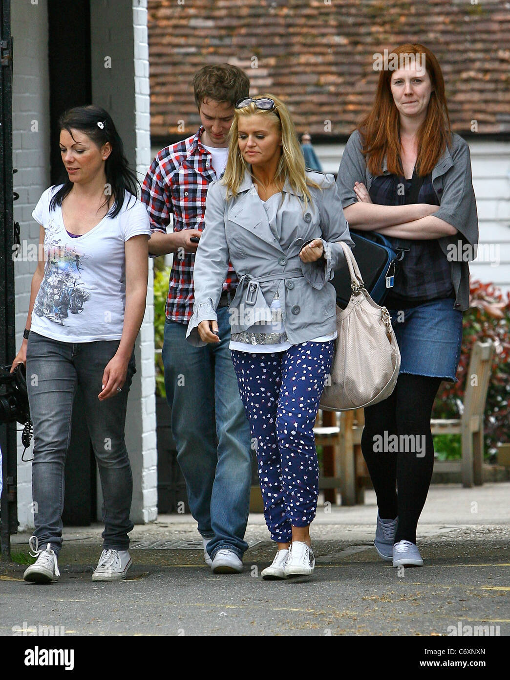 Kerry Katona with her children Max and Heidi, and accompanied by a film ...