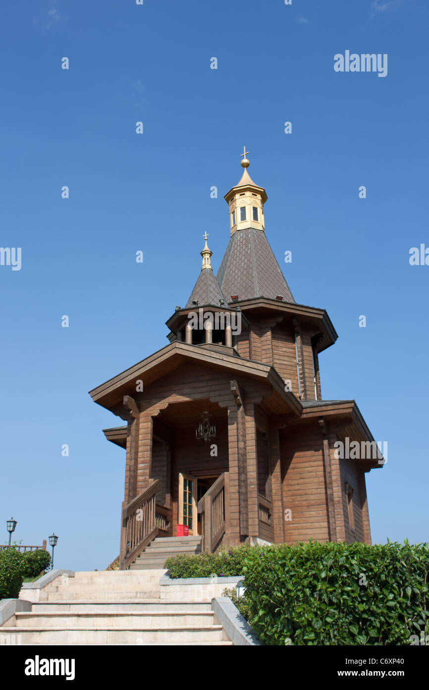 small wooden church with golden roof Stock Photo - Alamy