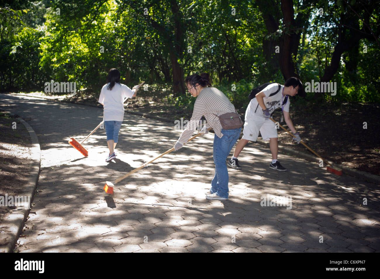 Student volunteers help clean up Prospect Park in Brooklyn in New York ...