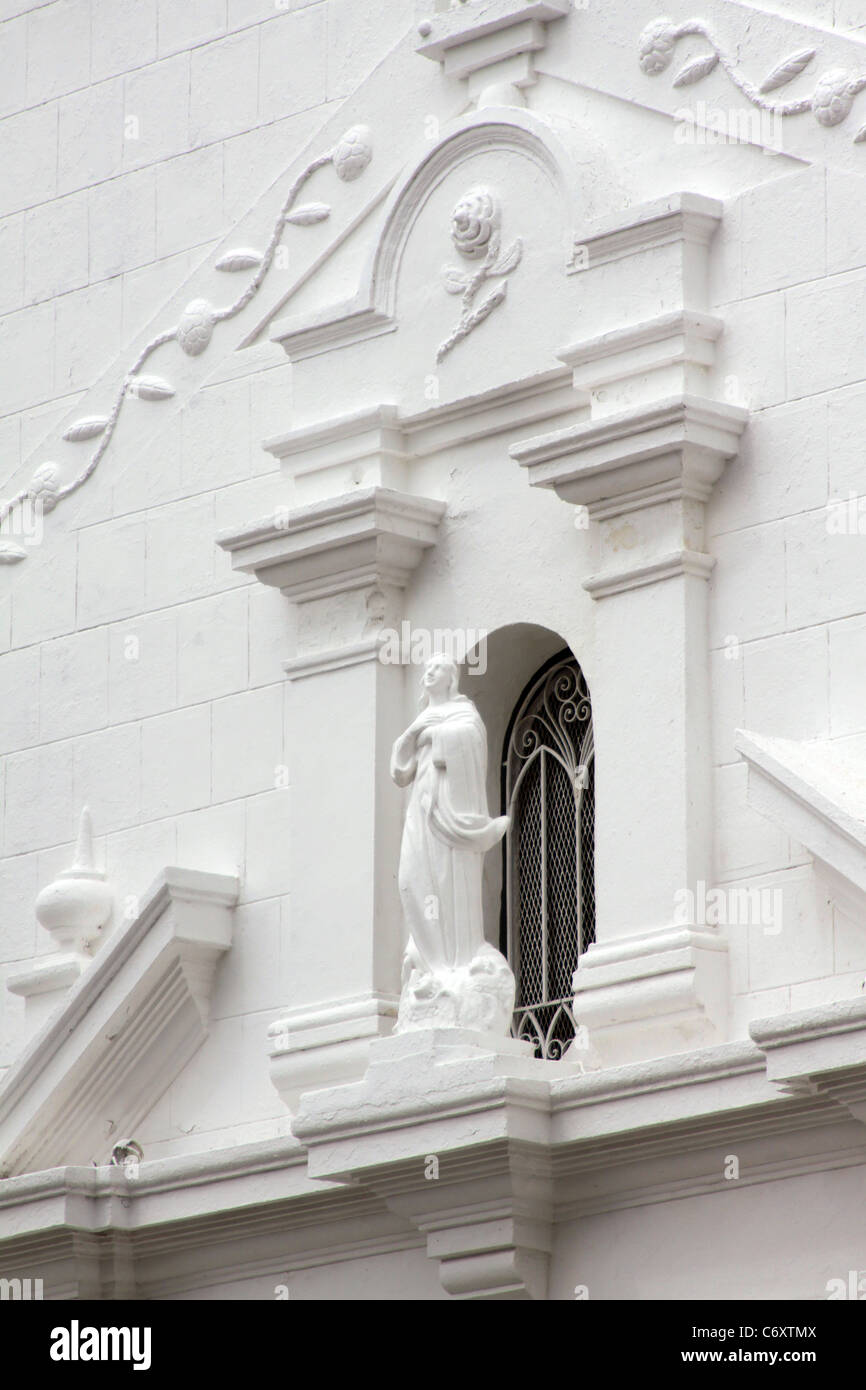 Virgin Mary statue on the facade of a rural church in the interior of ...