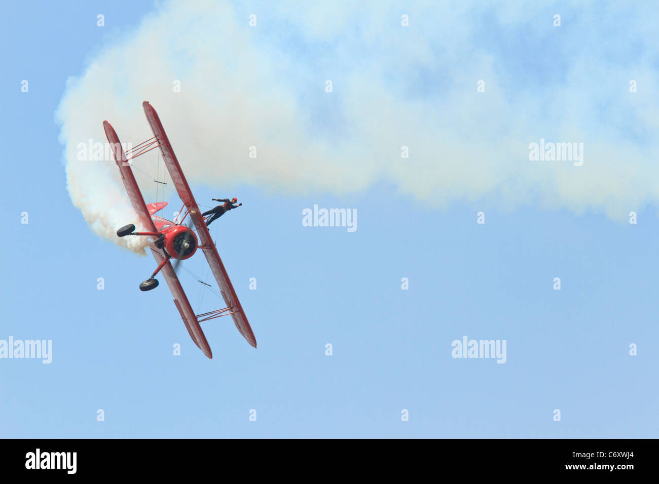 Biplane with wingwalker Stock Photo - Alamy