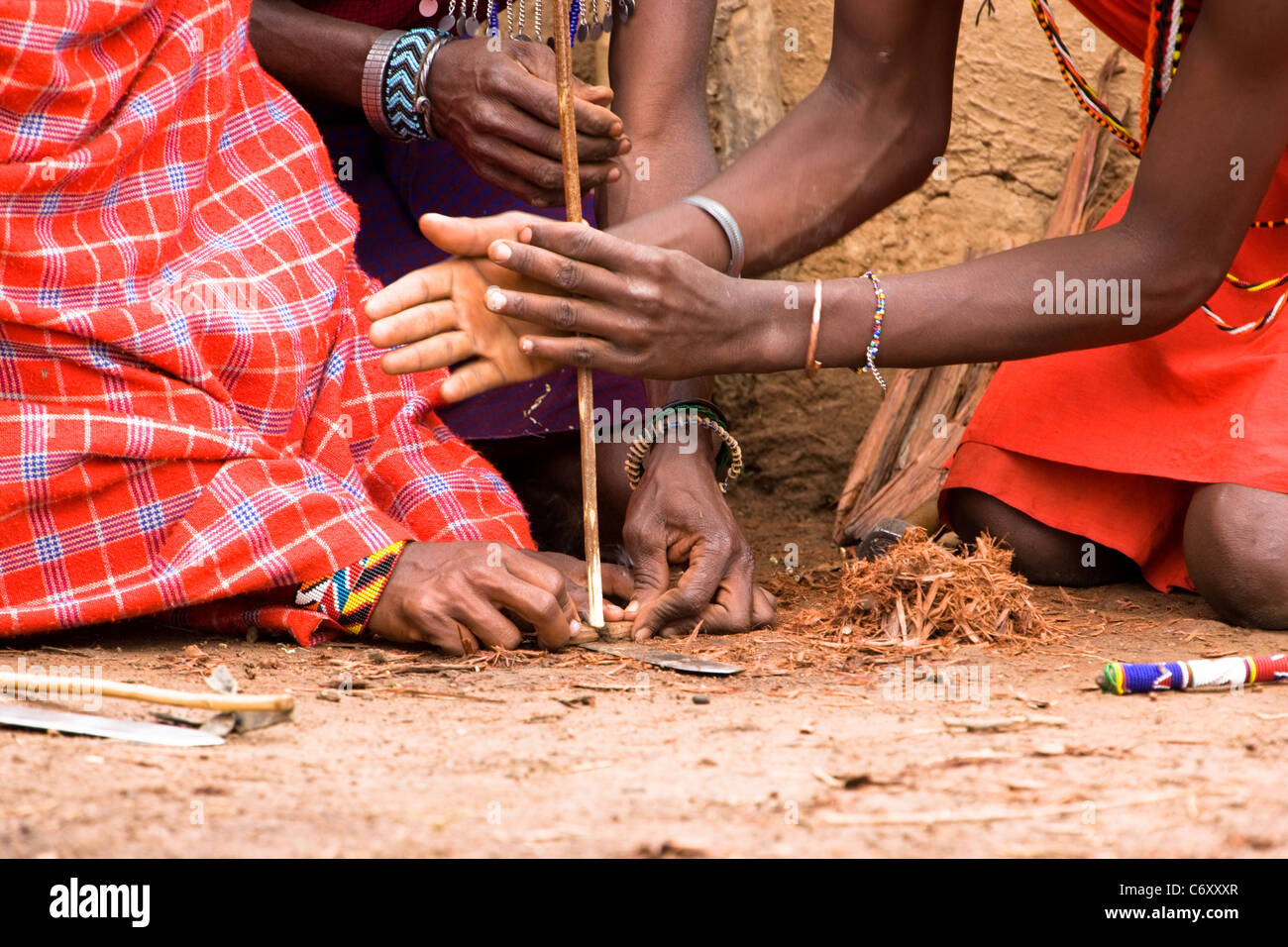 Maasai people making fire Stock Photo - Alamy