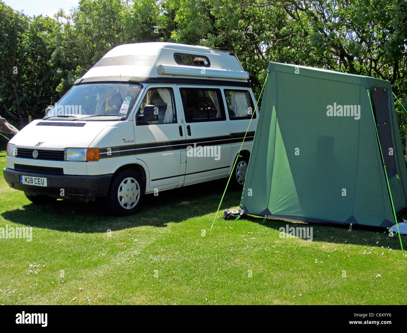 autosleeper Tirdent VW hi top campervan with a cuddy tent alongside ...