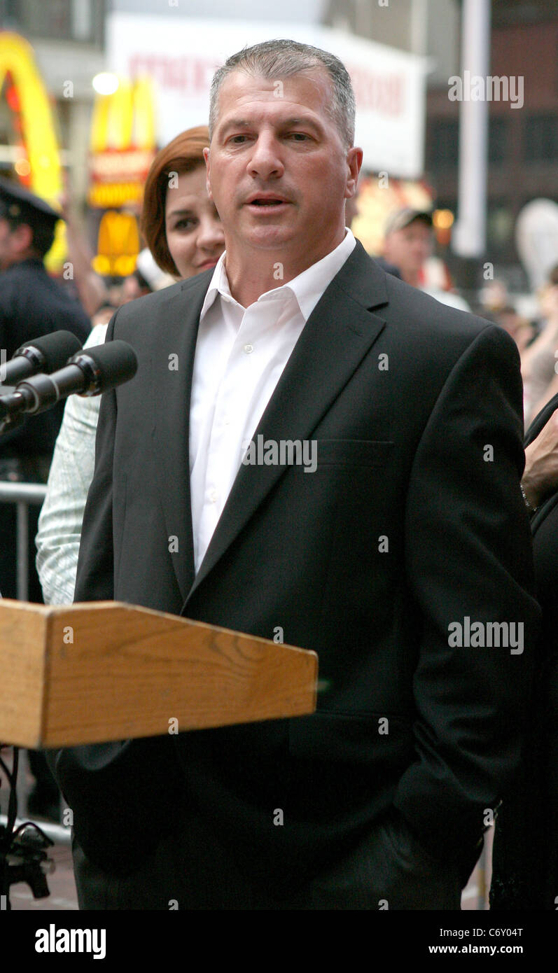 NYPD officer Wayne Rhatigan speaks as the officer being hailed as a ...