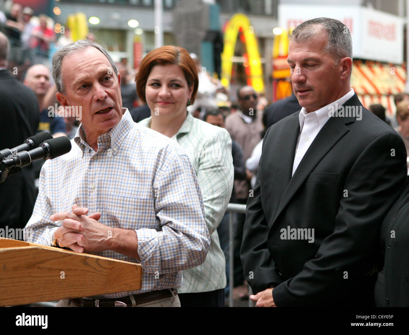 New York Mayor Michael Bloomberg speaks as NYPD officer Wayne Rhatigan ...