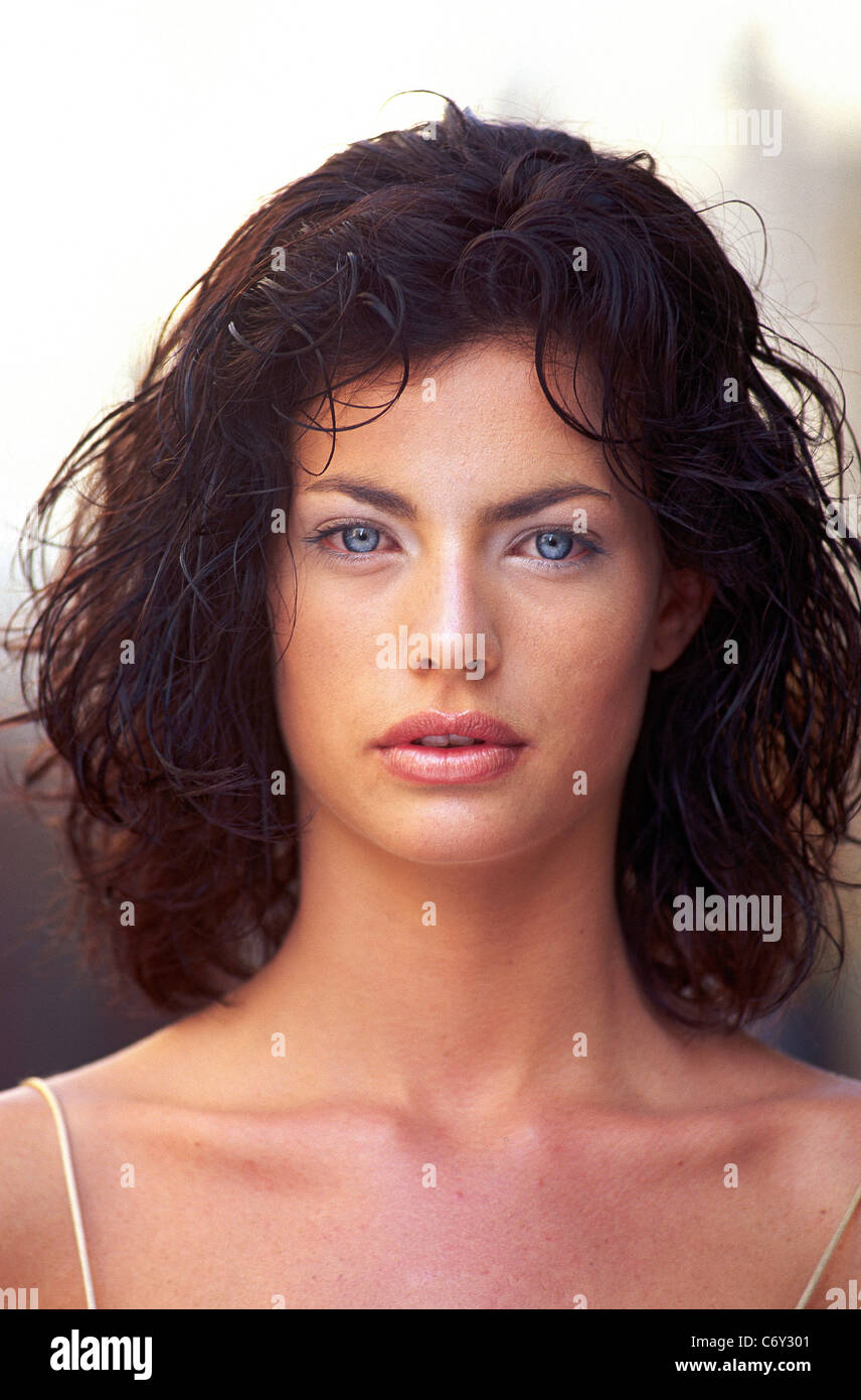 Young Caucasian Woman;18 to 23 years old. Light Blue Eyes. Black Hair ...