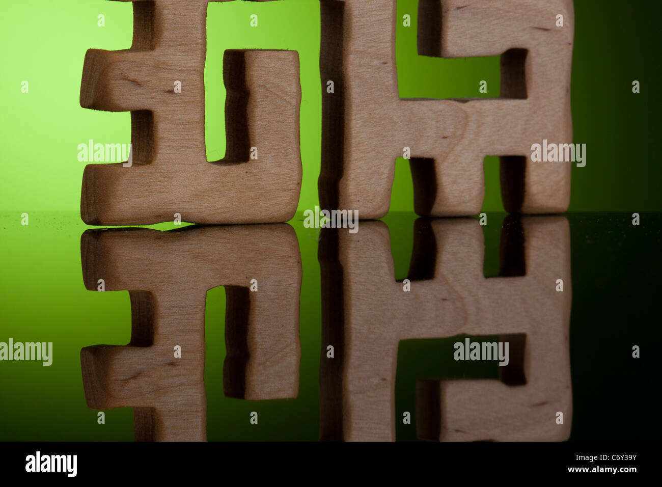 Latvian folklore sign with reflection Stock Photo - Alamy