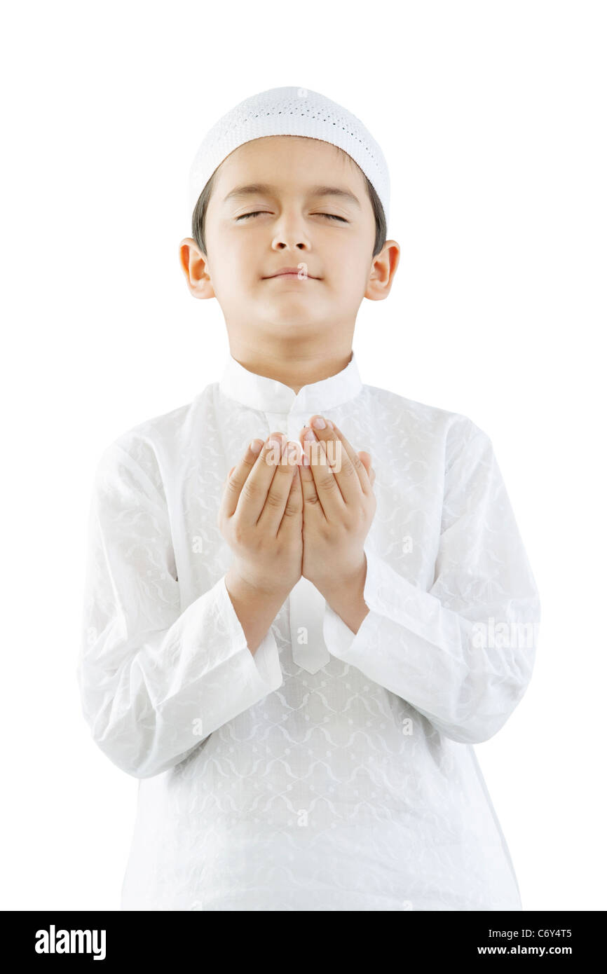 Muslim boy praying Stock Photo - Alamy