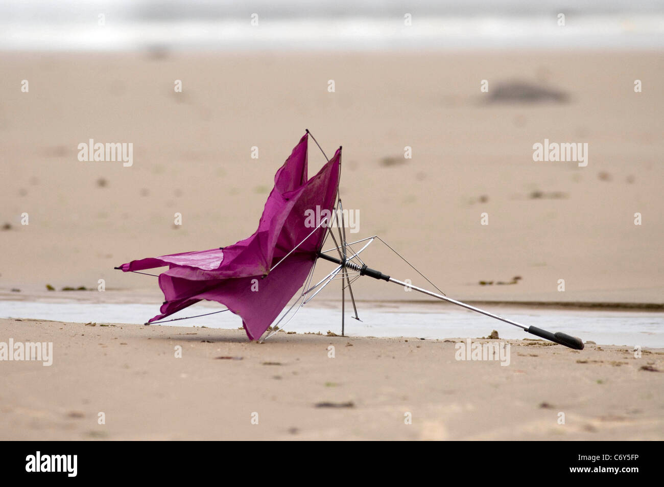 Broken umbrella hi-res stock photography and images - Alamy
