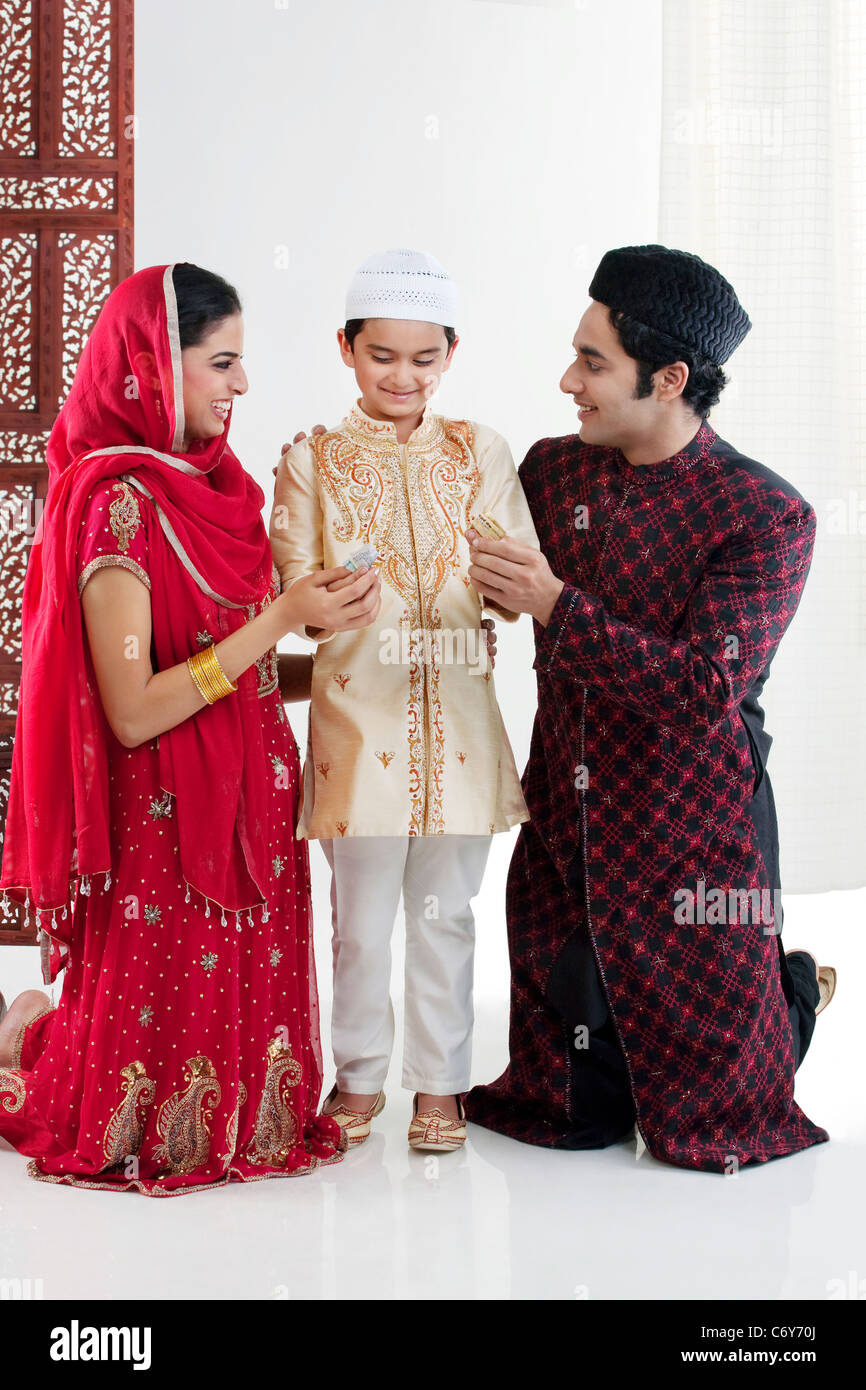 Muslim family parents three children hi-res stock photography and ...