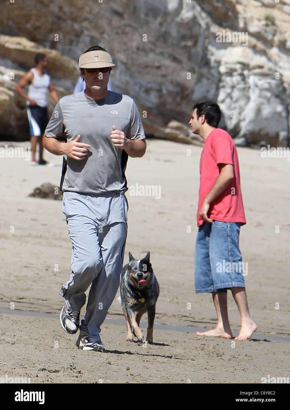 Luke Wilson jogging on the beach in Malibu with his dog Los Angeles ...