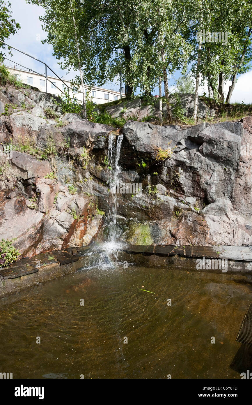 Small waterfall fountain in city park in Kallio Helsinki Finland Stock ...