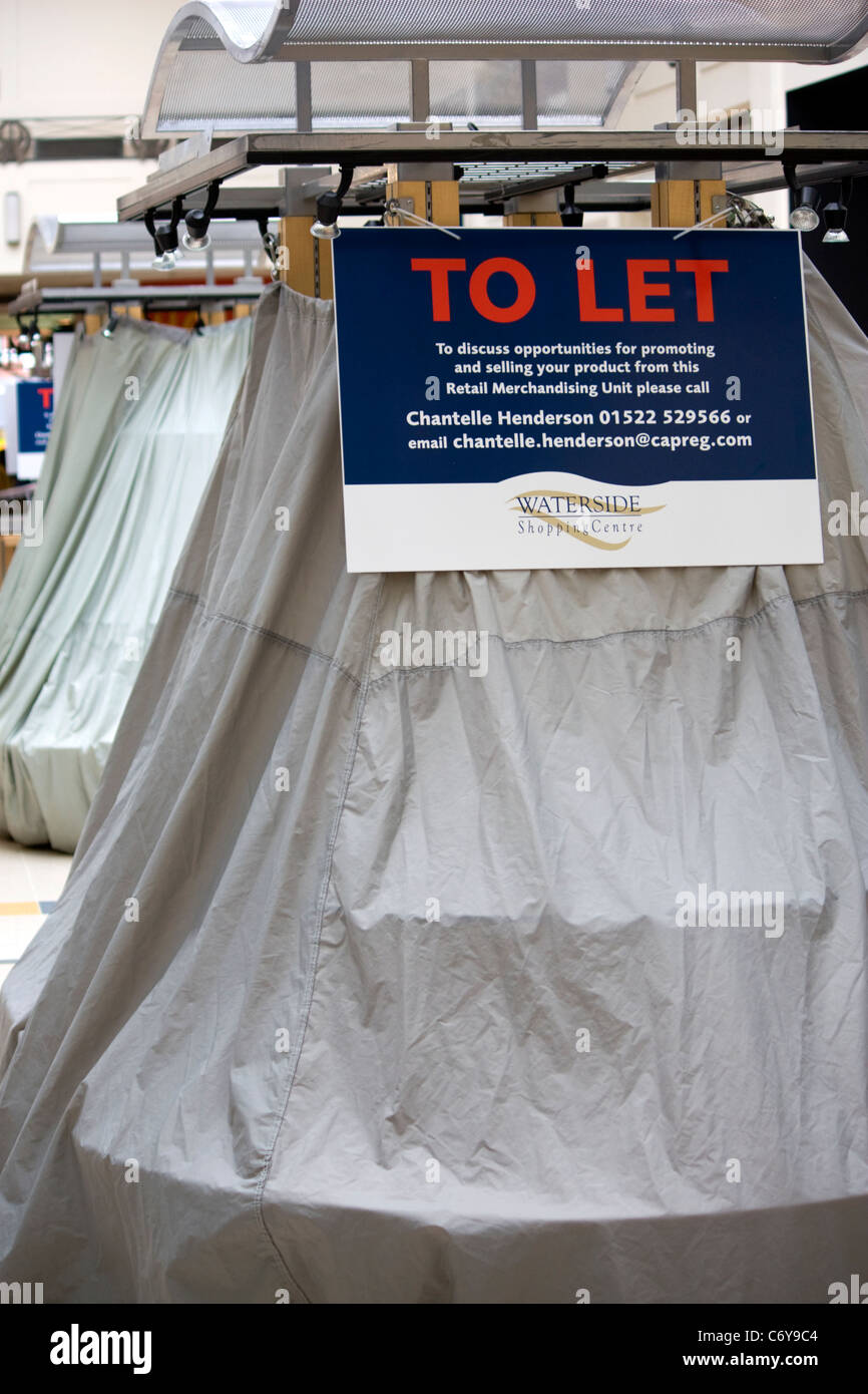 A stall to let in a shopping mall in the UK Stock Photo - Alamy