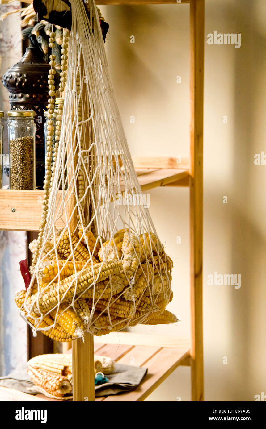 Hanged Dry Organic Corns In A Net Stock Photo - Alamy