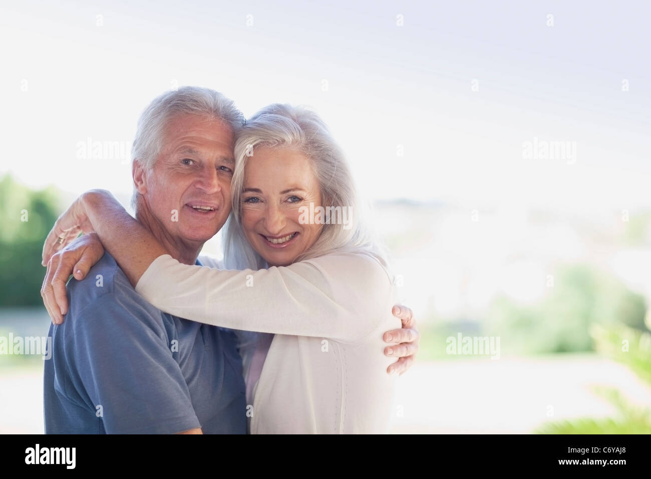 Older couple hugging outdoors Stock Photo - Alamy Older couple hugging outdoors Stock Photo - Alamy