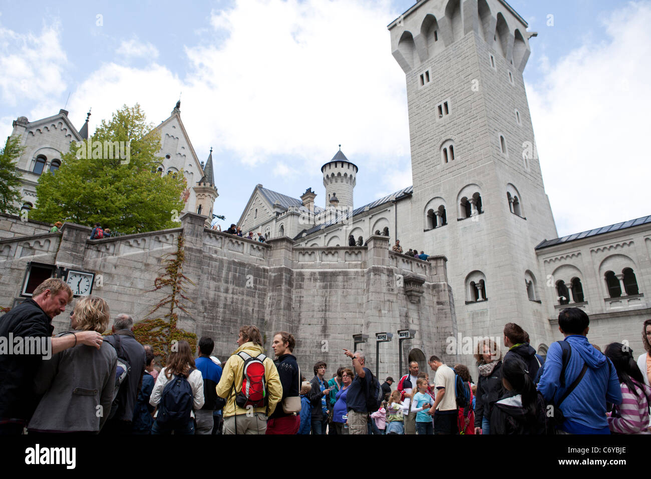 TOURISTS WAITING IN LINE FOR THEIR TURN TO VISIT THE CASTLE OF ...
