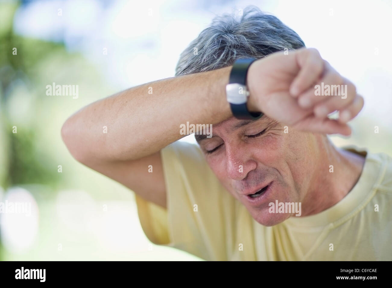 Hands wiping sweat brow hi-res stock photography and images - Alamy
