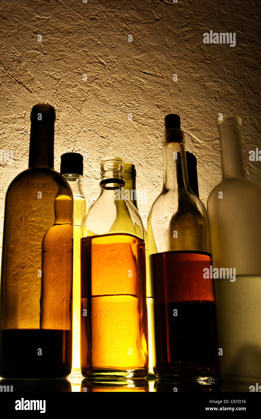Bottles of alcohol drinks in a row Stock Photo - Alamy
