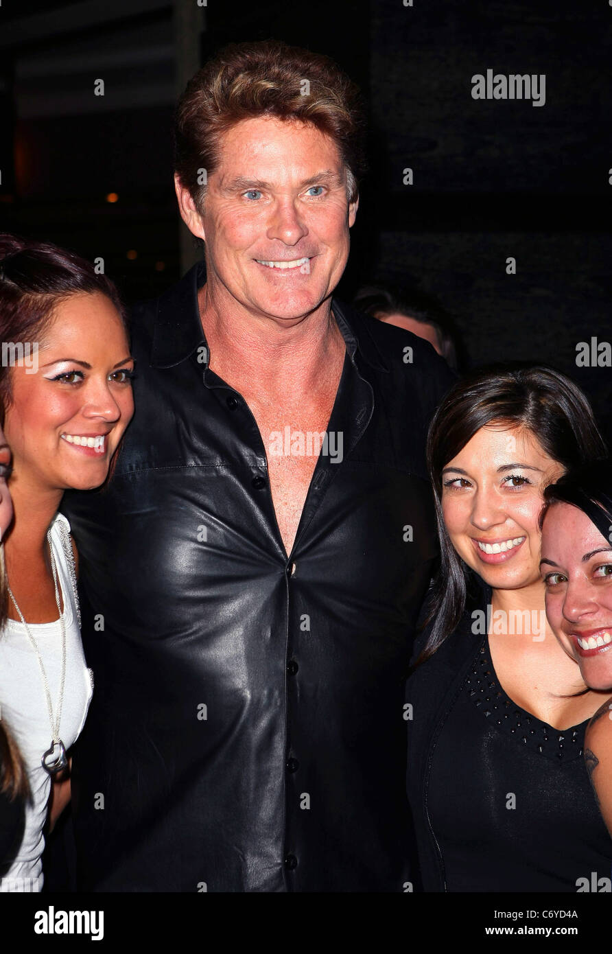 David Hasselhoff poses for pictures with fans inside the Planet ...