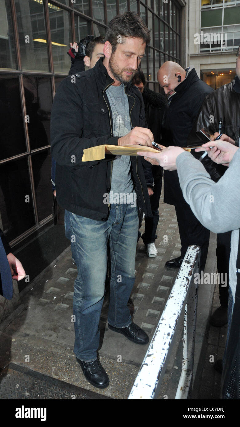 Gerard Butler signs autographs outside the Radio One studios London ...