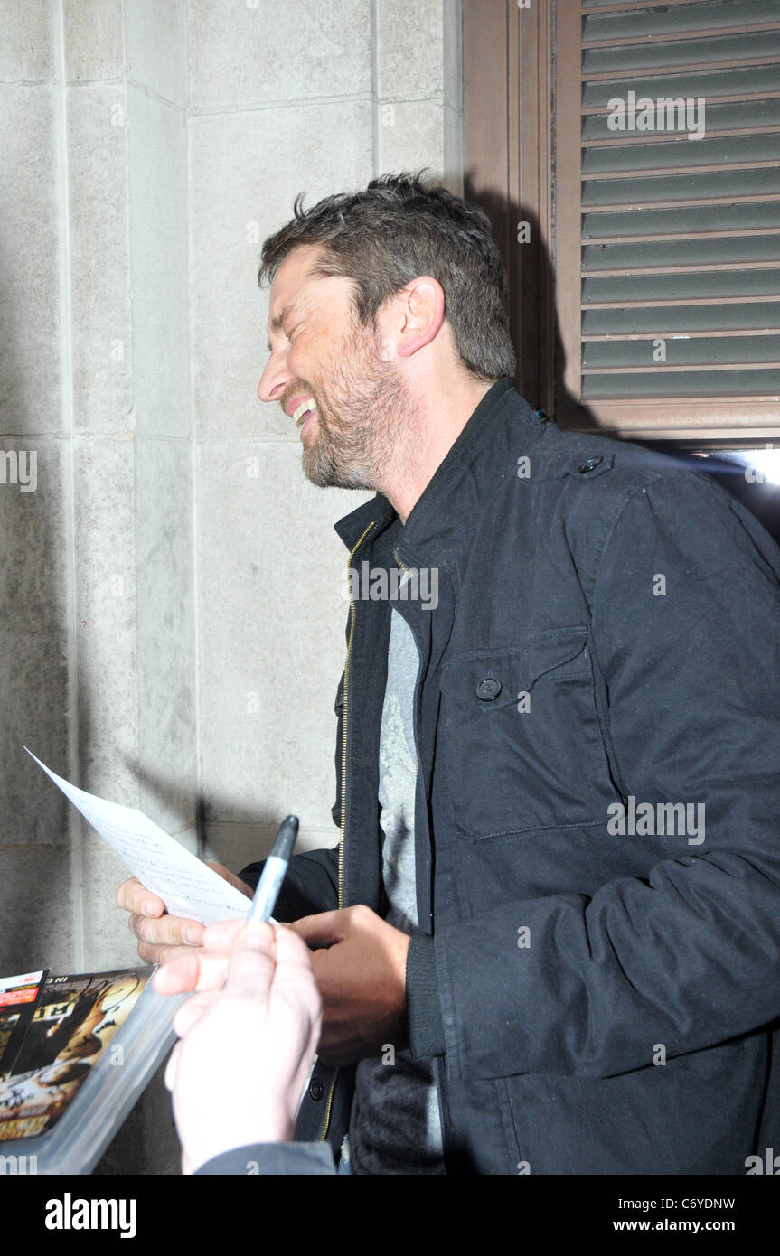 Gerard Butler signs autographs outside the Radio One studios London ...