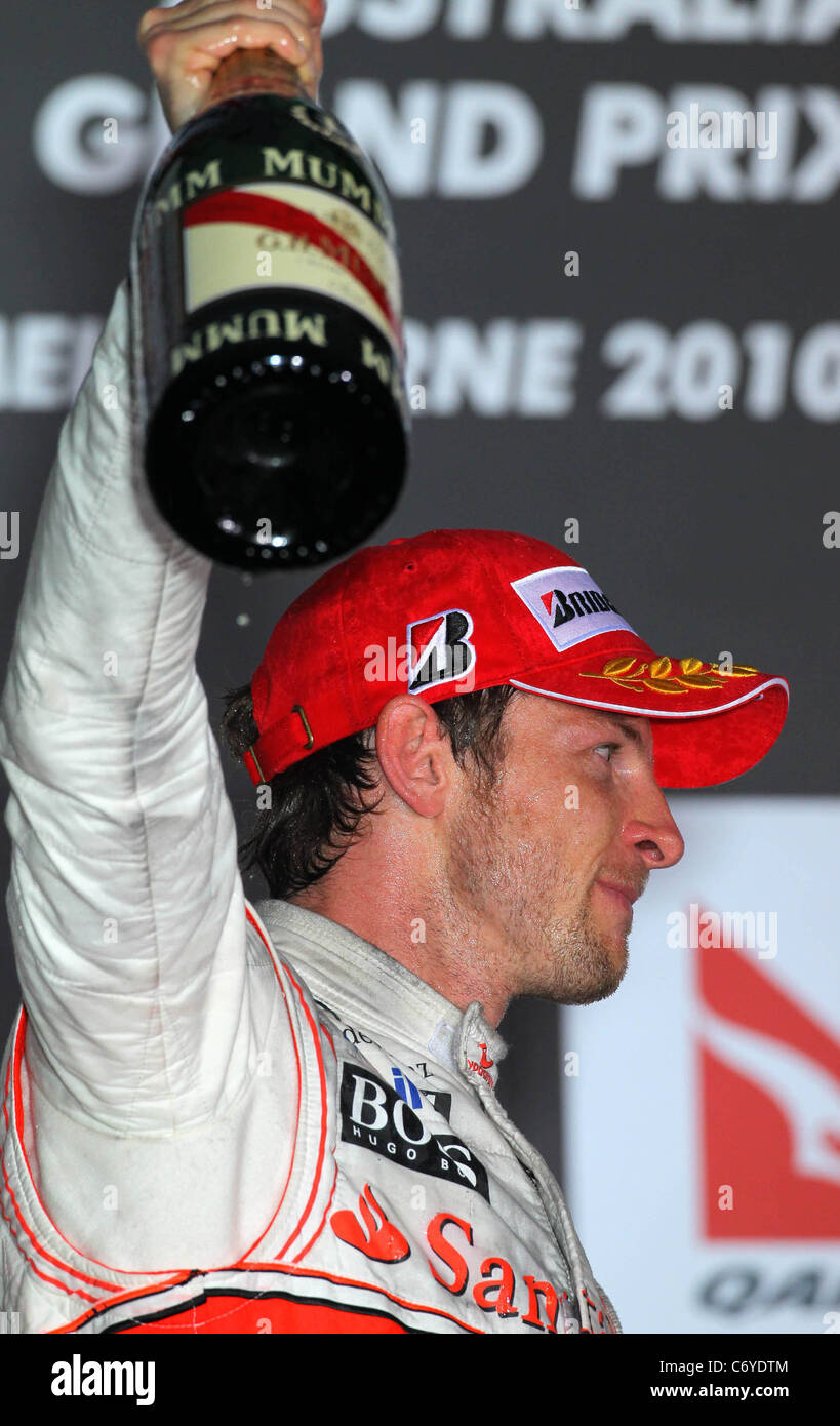 Jenson Button celebrates on the podium after winning Formula One's ...