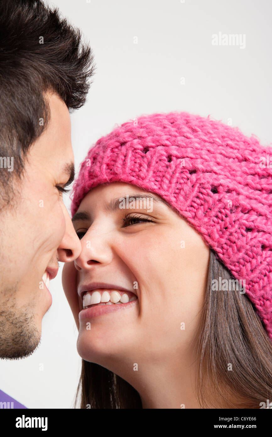 Smiling couple touching noses hi-res stock photography and images - Alamy