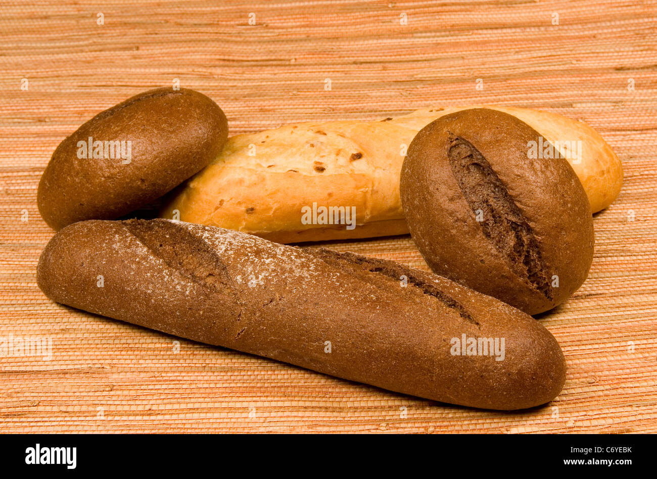 Rye and white bread on a straw cloth Stock Photo - Alamy