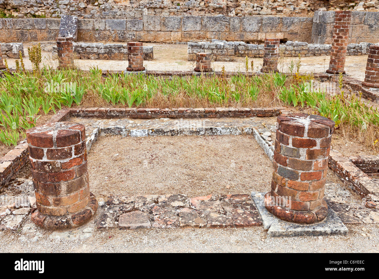 Peristyle with brick columns in the House of the Skeletons Villa in ...