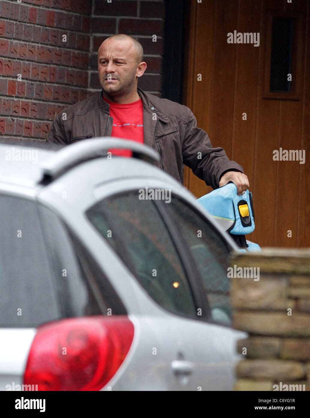 Mark Croft leaves Kerry Katona's home after collecting their children ...