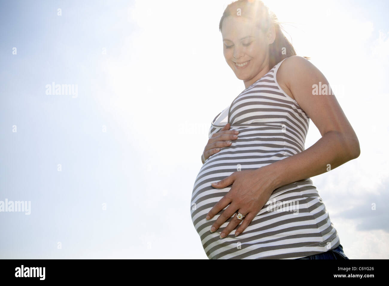Woman belly low angle hi-res stock photography and images - Alamy
