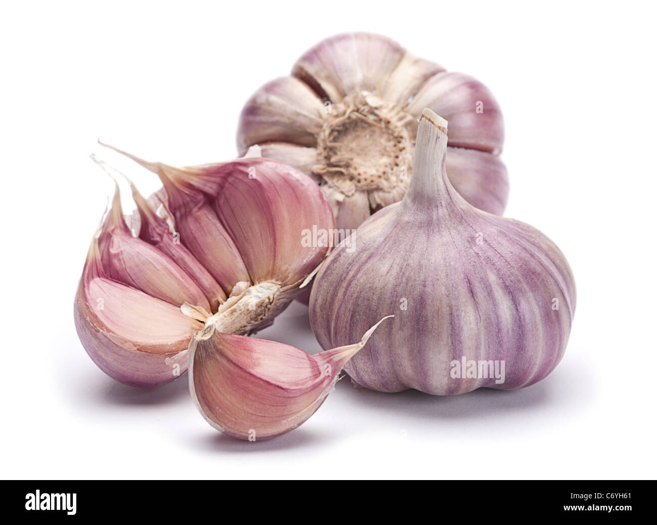 Garlic vegetable closeup isolated on white background Stock Photo - Alamy
