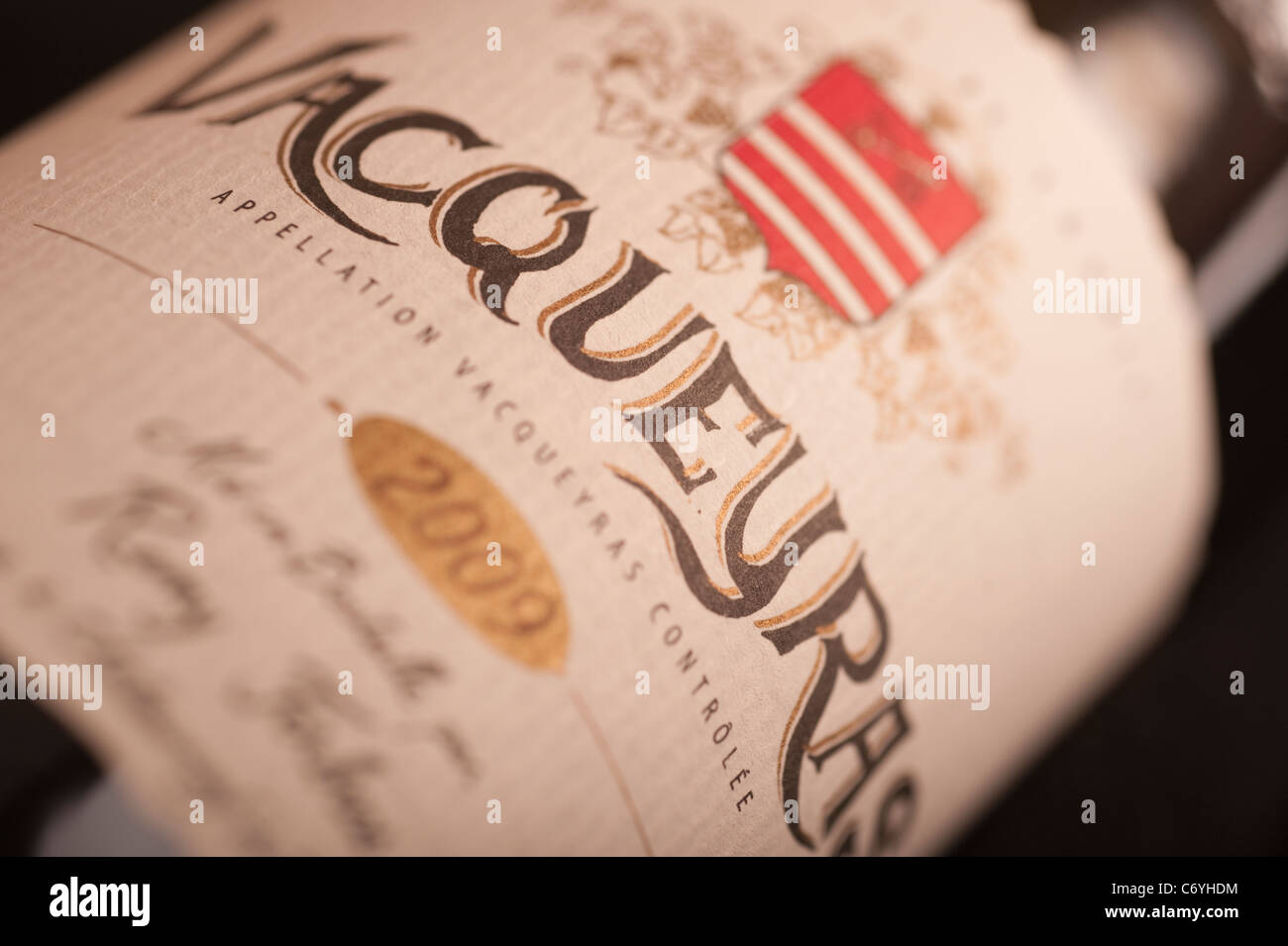 Vacqueyras wine bottle label closeup with crest Stock Photo - Alamy