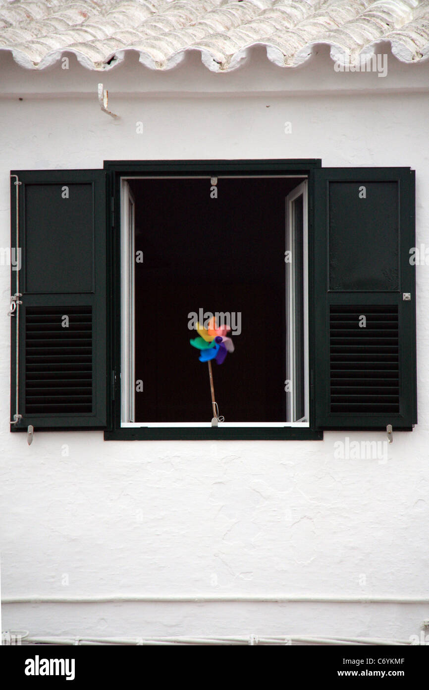 A windmill in the window Stock Photo - Alamy