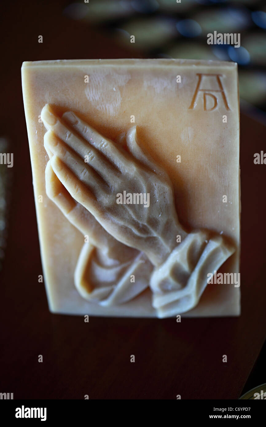 Praying hands made of beeswax Greece Stock Photo - Alamy