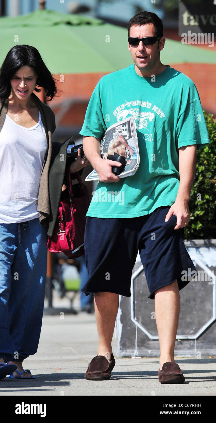 Adam Sandler walking with a friend in Santa Monica Los Angeles ...