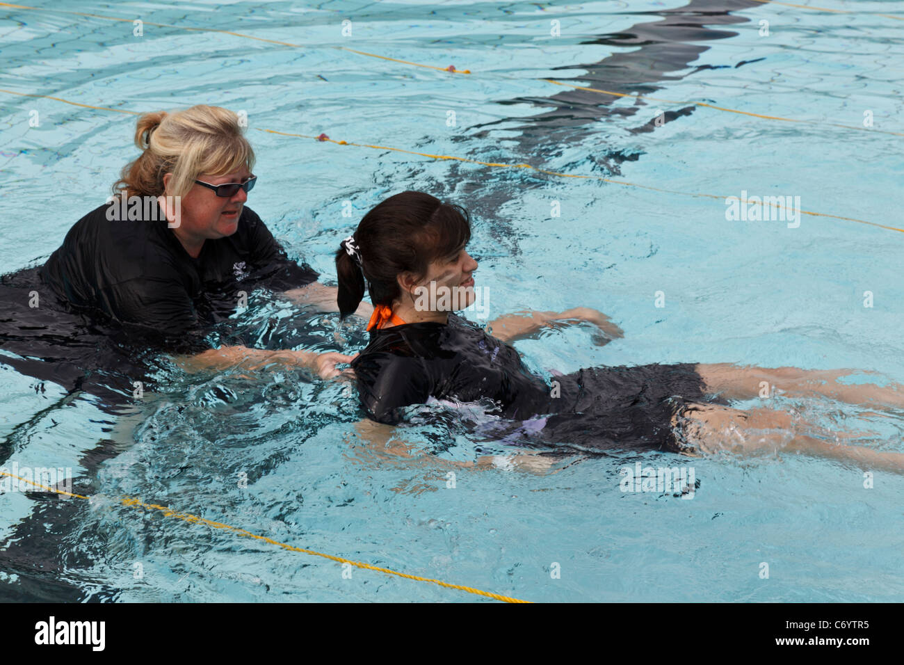 Acquired brain injury patients with disabilities participate in an ...
