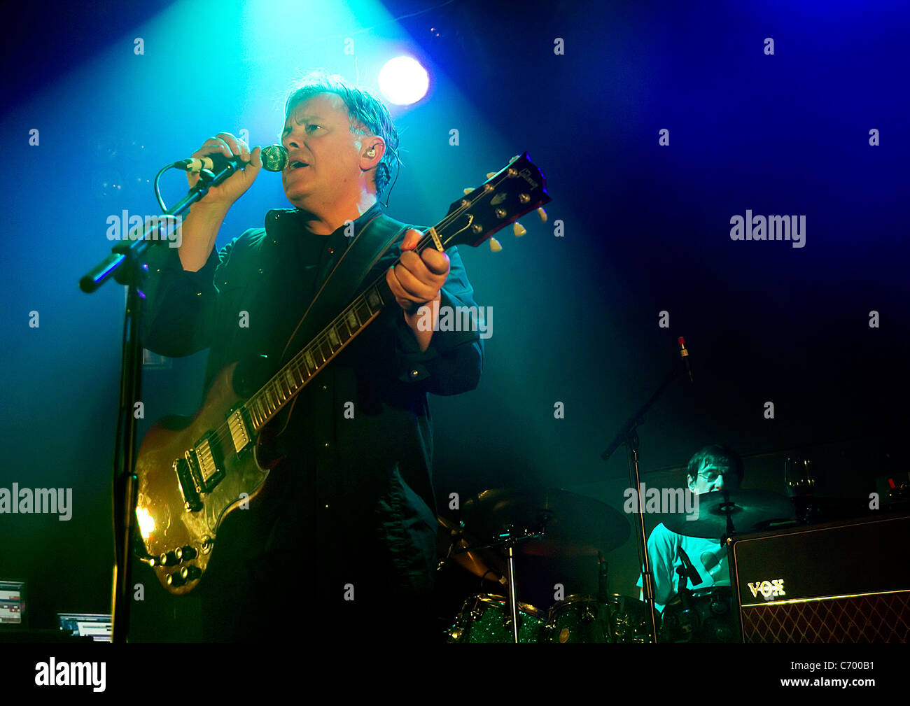 Bernard Sumner and Jake Evans of Bad Lieutenant performing at Liverpool ...