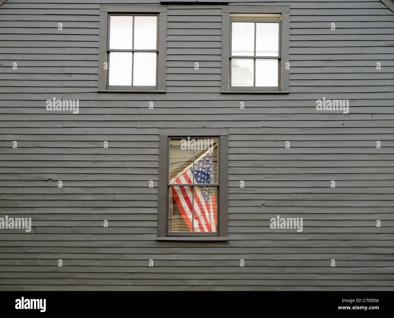 American flag in house window Stock Photo - Alamy