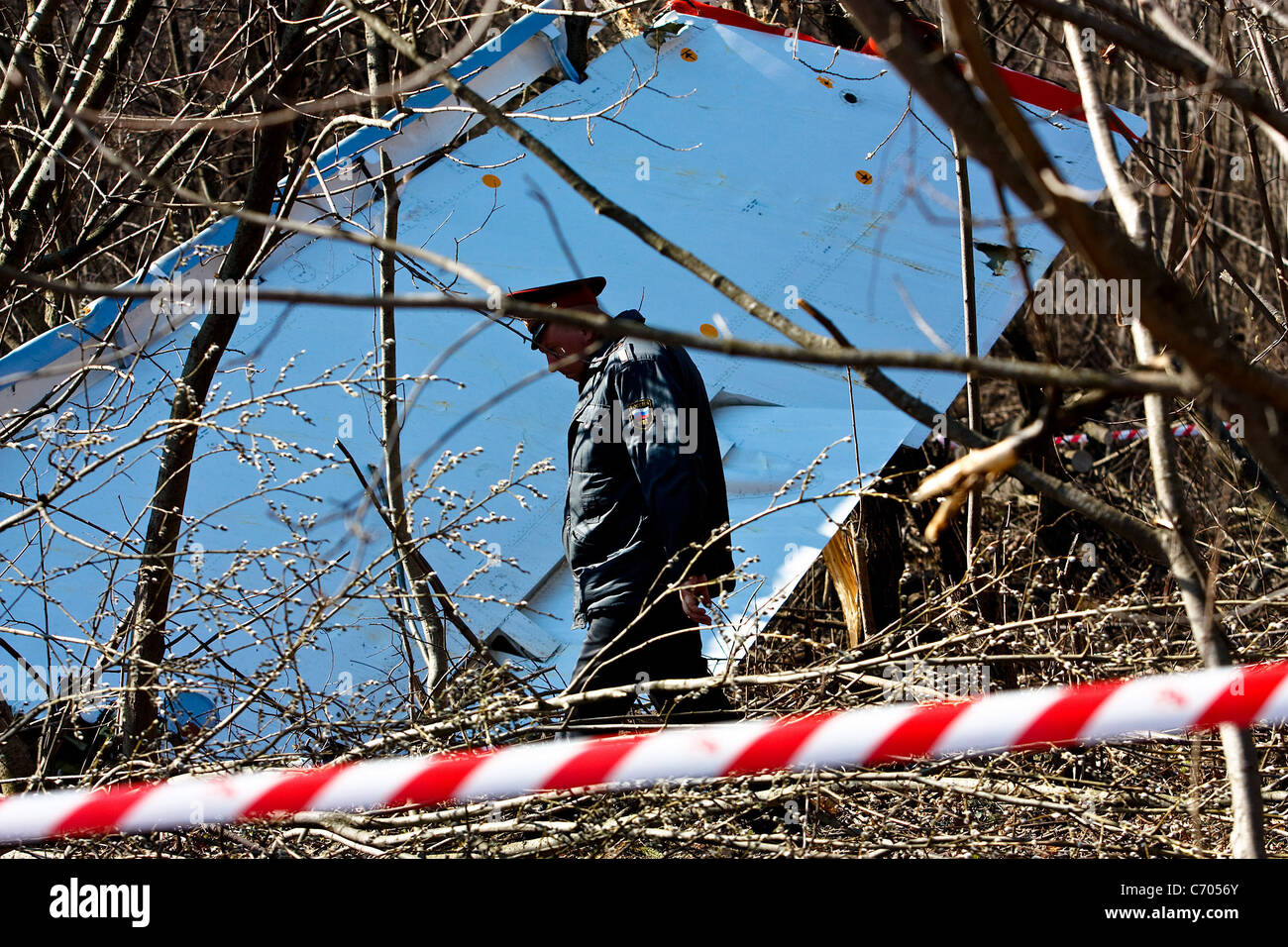 Police blocking the plane crash site at Severny military airport and a ...