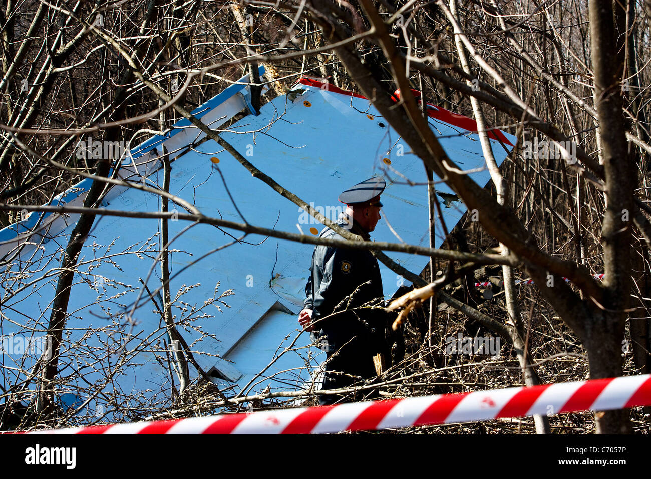 Police blocking the plane crash site at Severny military airport and a ...