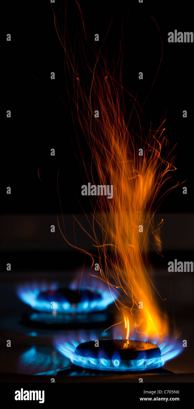 flame sand sparks over gas stove Stock Photo - Alamy