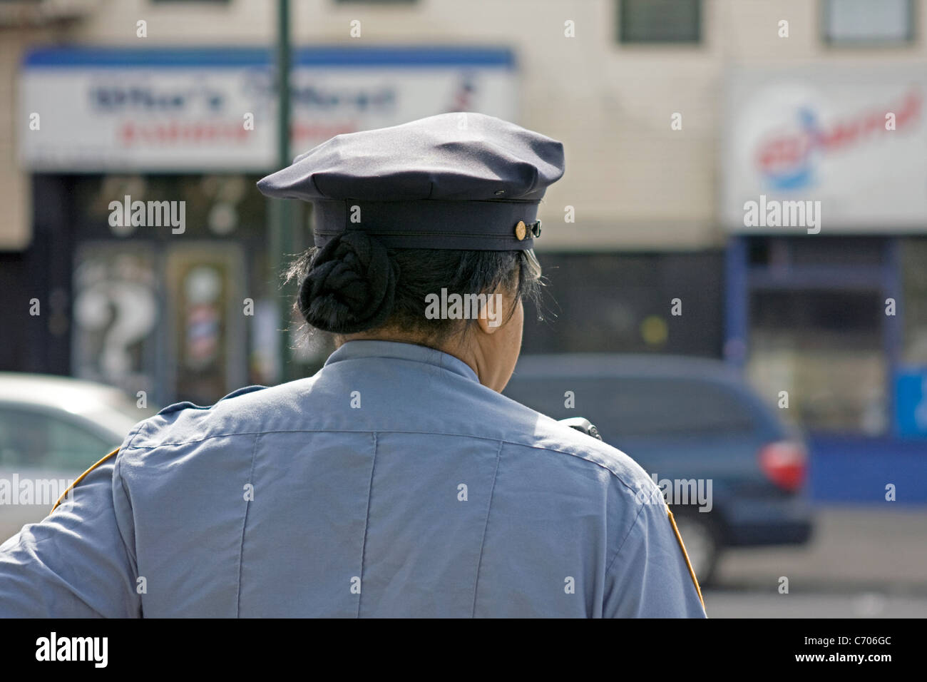 A New York City police officer patrols a section of Brooklyn in the ...