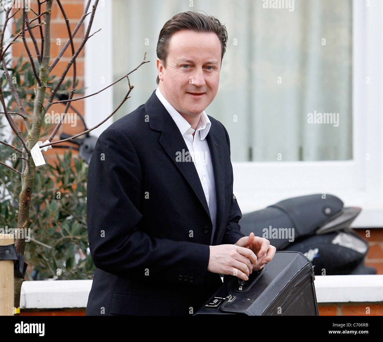 David Cameron leaving his home following the announcement he is ...