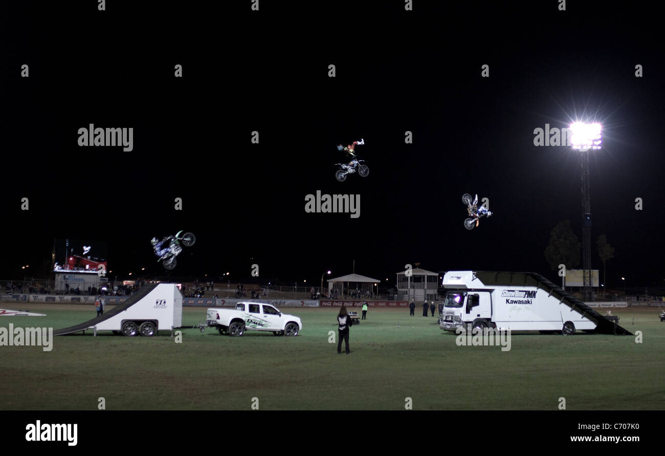 Three Motorcyclists Jumping Simultaneously Stunt Evil K Style Stock ...