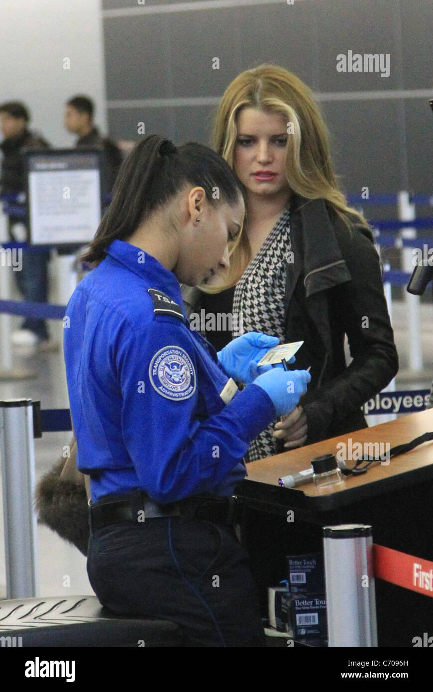 Jessica Simpson checking in for a flight at JFK airport New York City ...