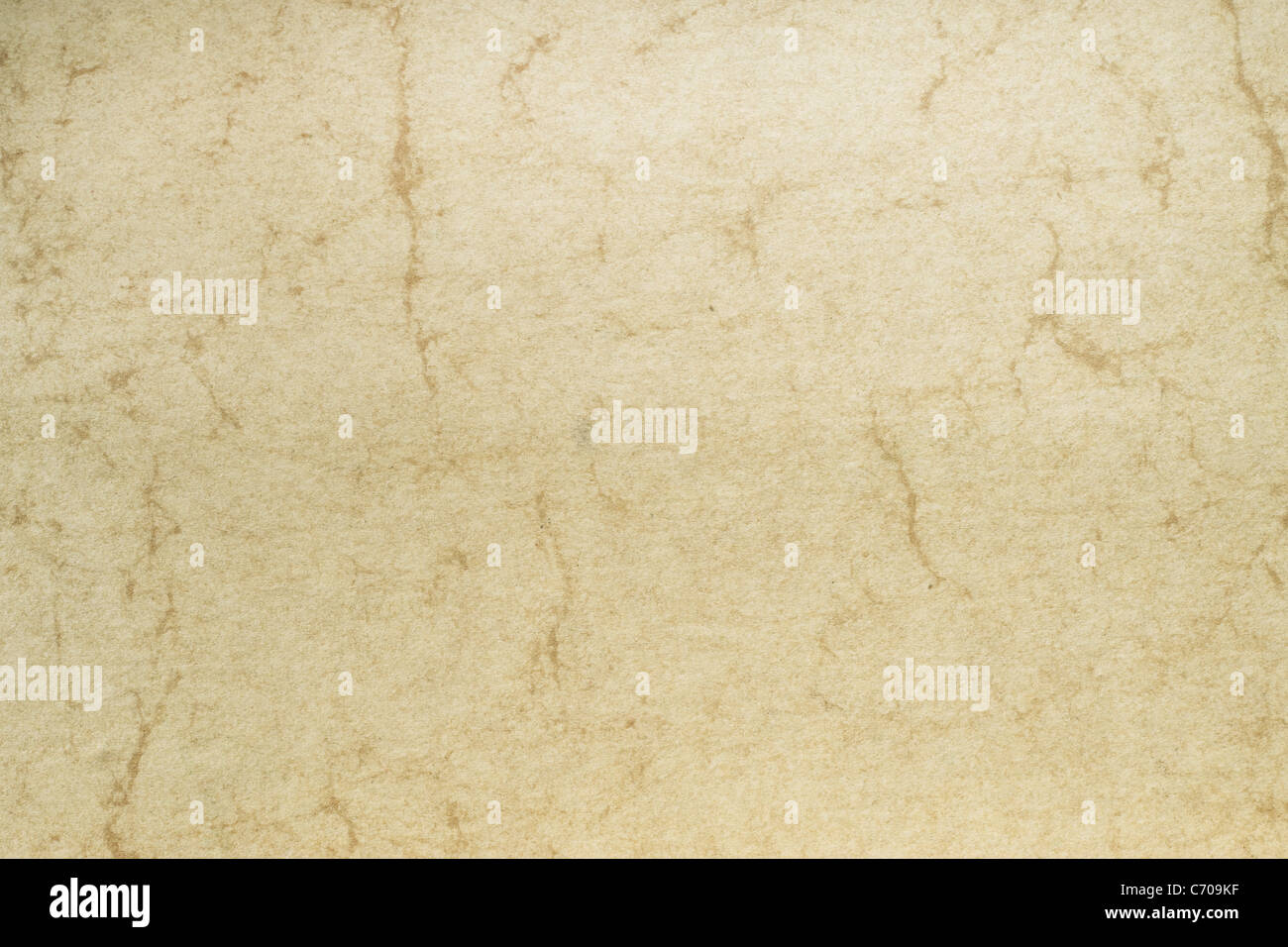 Old gone yellow paper as a background motive Stock Photo - Alamy