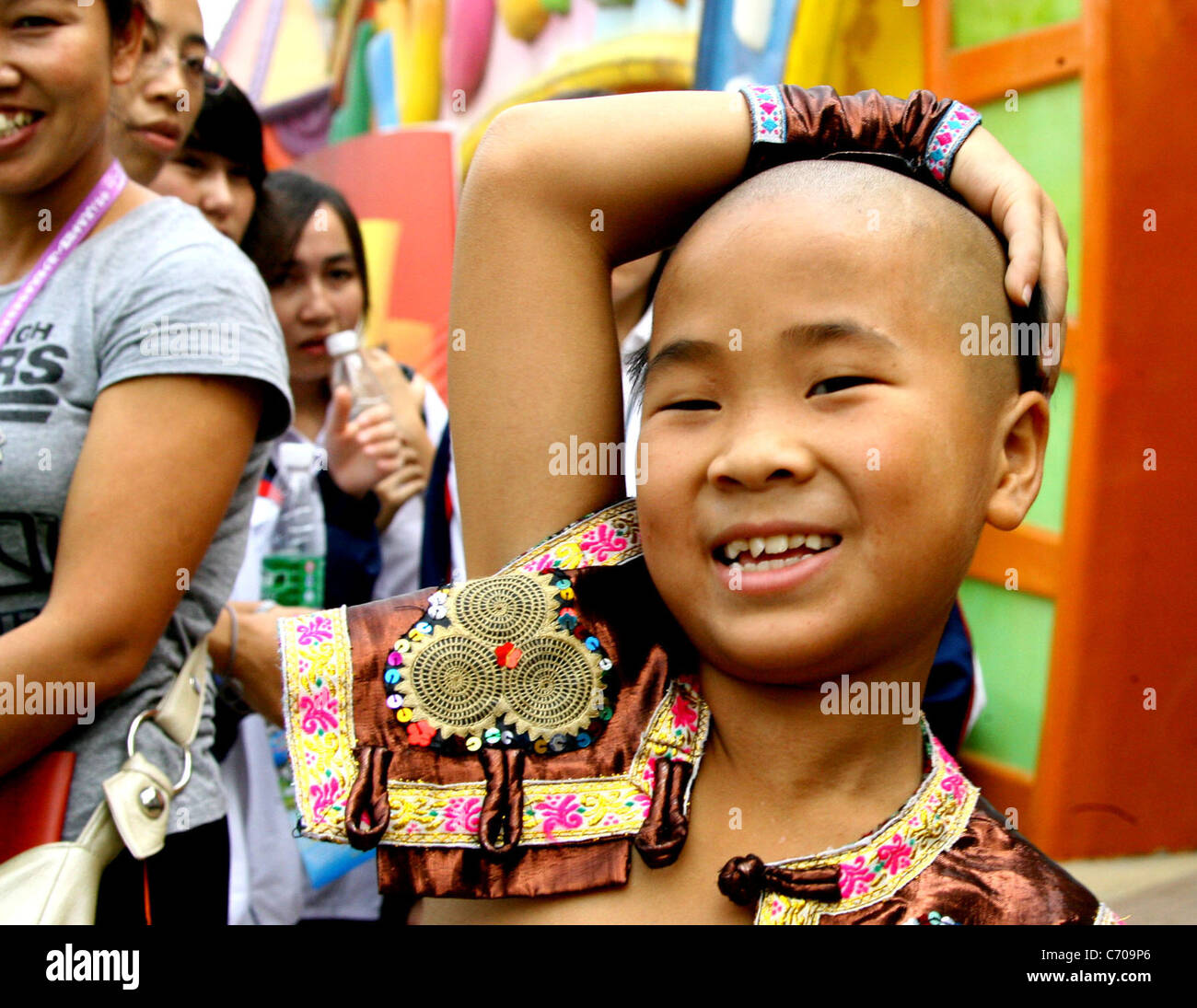 Lu Yangkang, a six-year-old boy from Guizhou Province, smiles while ...