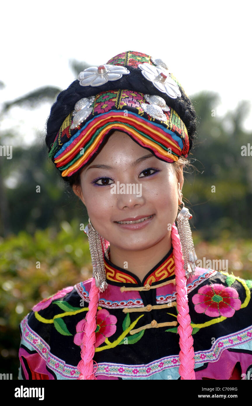 Yang Jiali of the Qiang ethnic minority displaying her folk costumes in ...